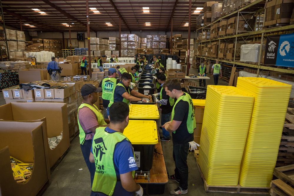 PHOTOS: Habitat for Humanity assembles 2,000 shelter repair kits to aid ...